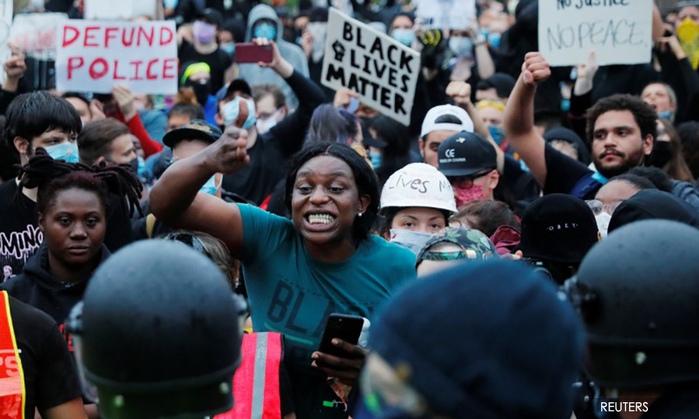 Protests swell in major US cities despite curfews, Trump vows to crack down