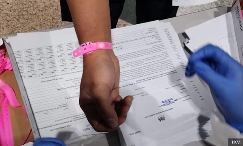 Duo wearing pink wristbands nabbed while filling up BSH form