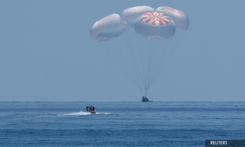 Nasa astronauts make historic return home aboard SpaceX capsule