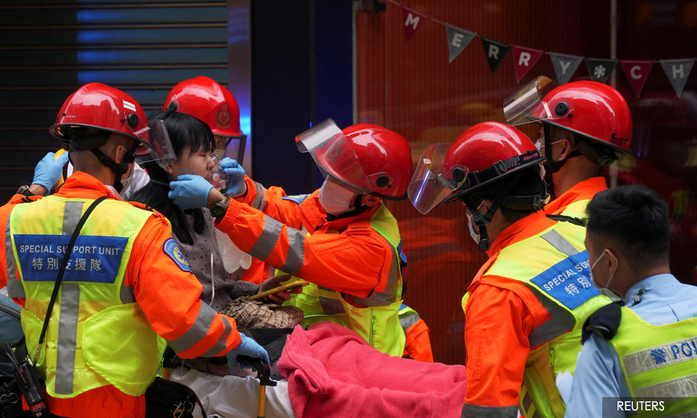 Hong Kong firefighters douse fire that trapped 150 people on trade ...
