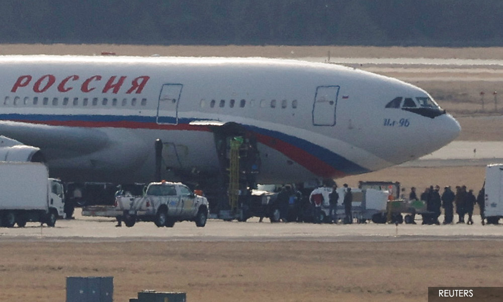 Russia flying out UN diplomats expelled by US, officials say