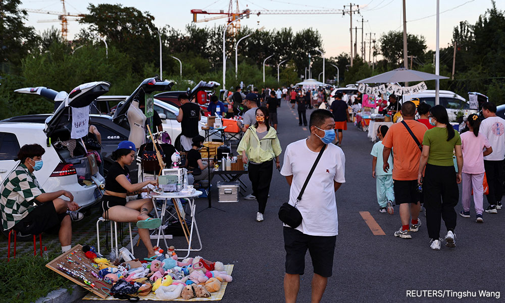 China's jobless turn to car boot sales as Covid-hit economy stalls