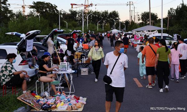 China's jobless turn to car boot sales as Covid-hit economy stalls