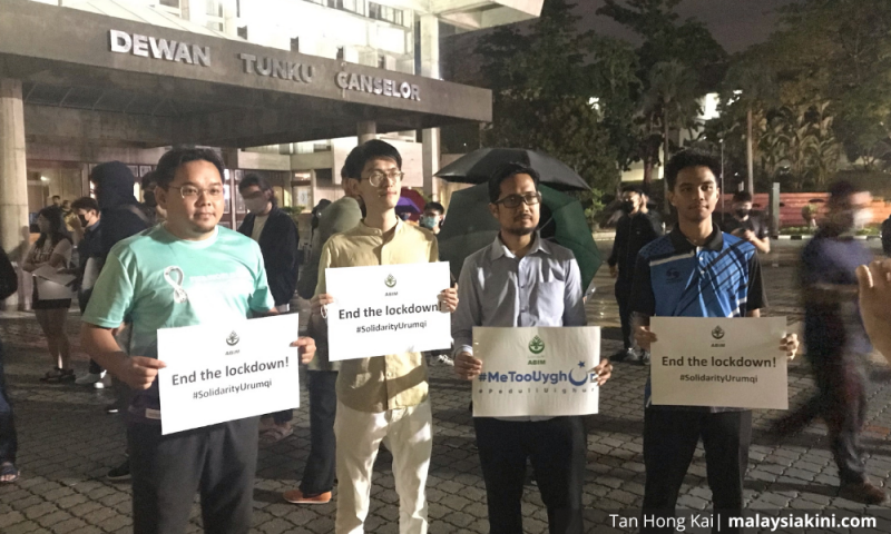 Candlelight vigil in UM to protest Urumqi fire in China