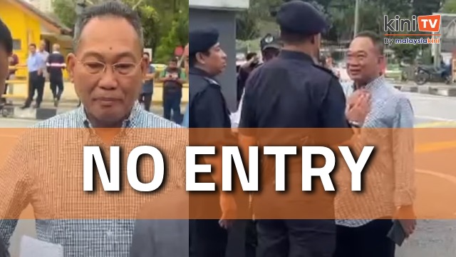 Police stop PAS MP Awang Hashim from entering court as Sanusi is charged