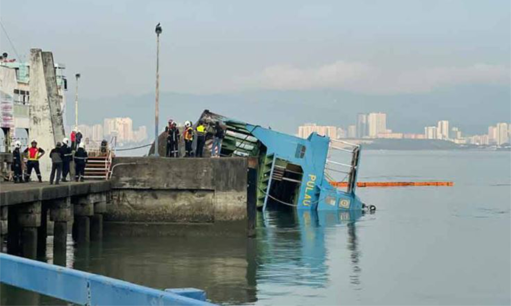 Iconic Penang ferry sinks at Sultan Abdul Halim terminal